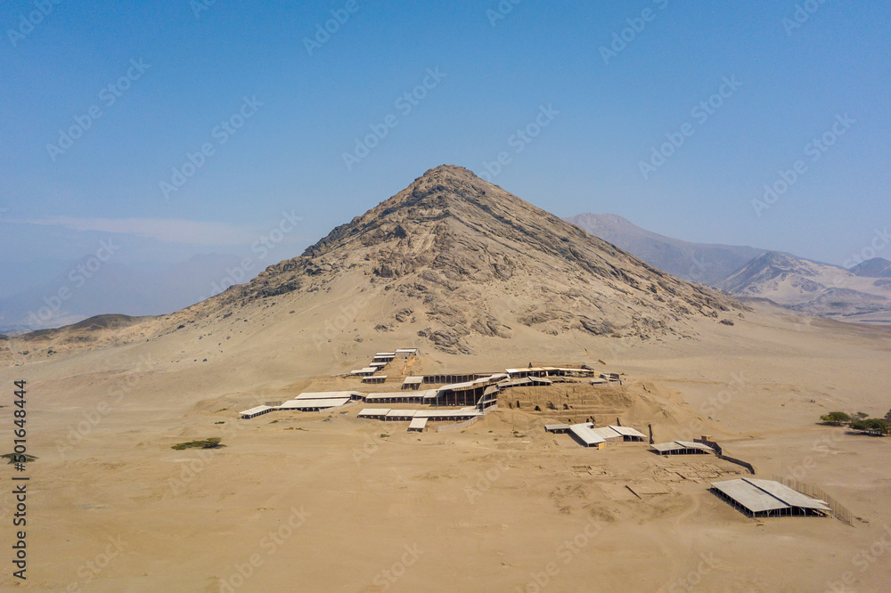 The remains of a Moche pyramid being excavated in the desert of ...