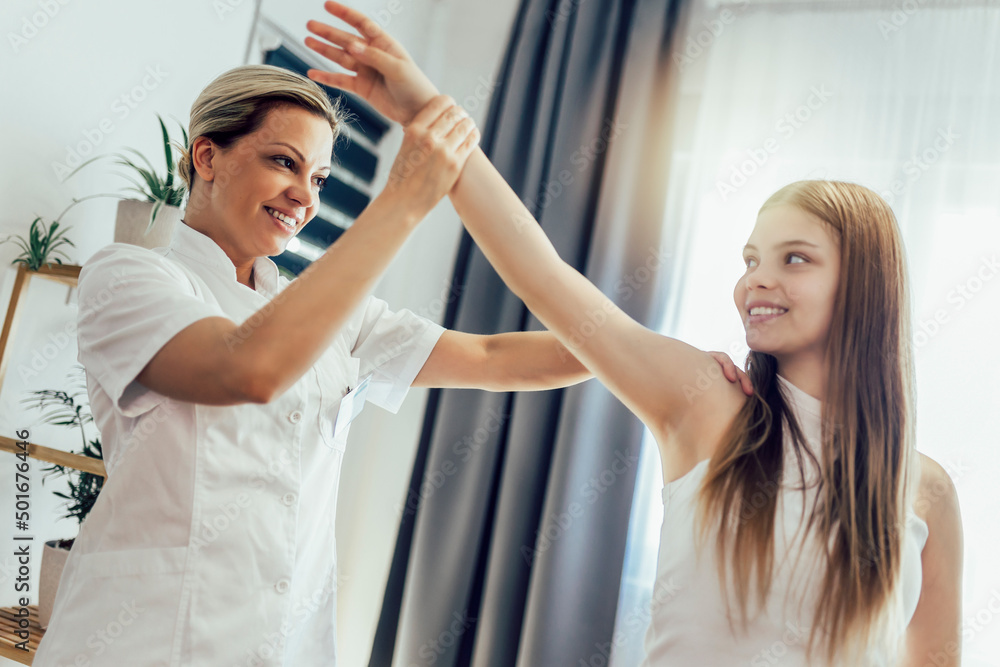 Physical therapy for children. Bad posture correction. Stock Photo ...