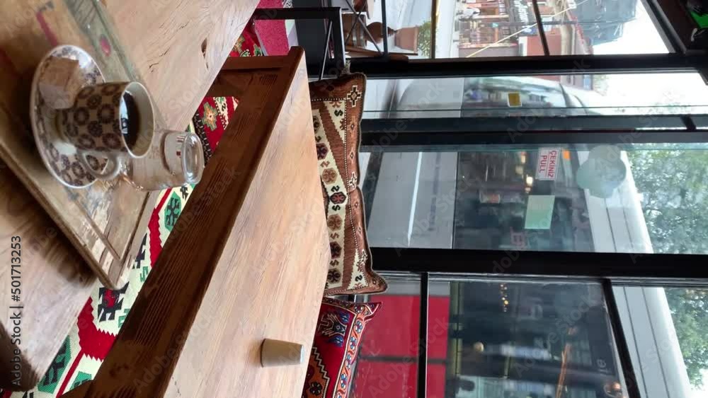 Traditional turkish coffee shop and modern tram in Istanbul, Turkey ...