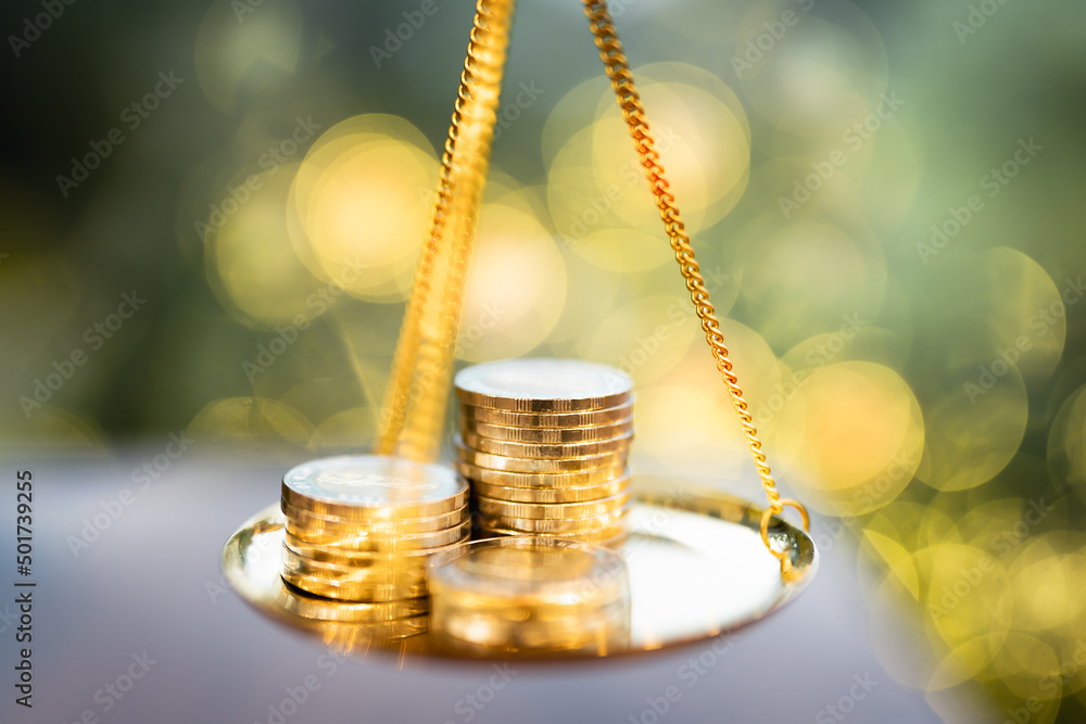 Coins stack with balance scale. Money management, financial plan, time ...