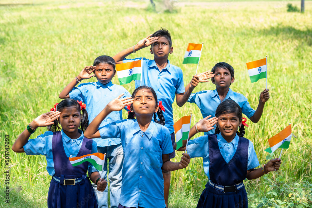 Fotografia do Stock: Group of village school children with Indian flag ...