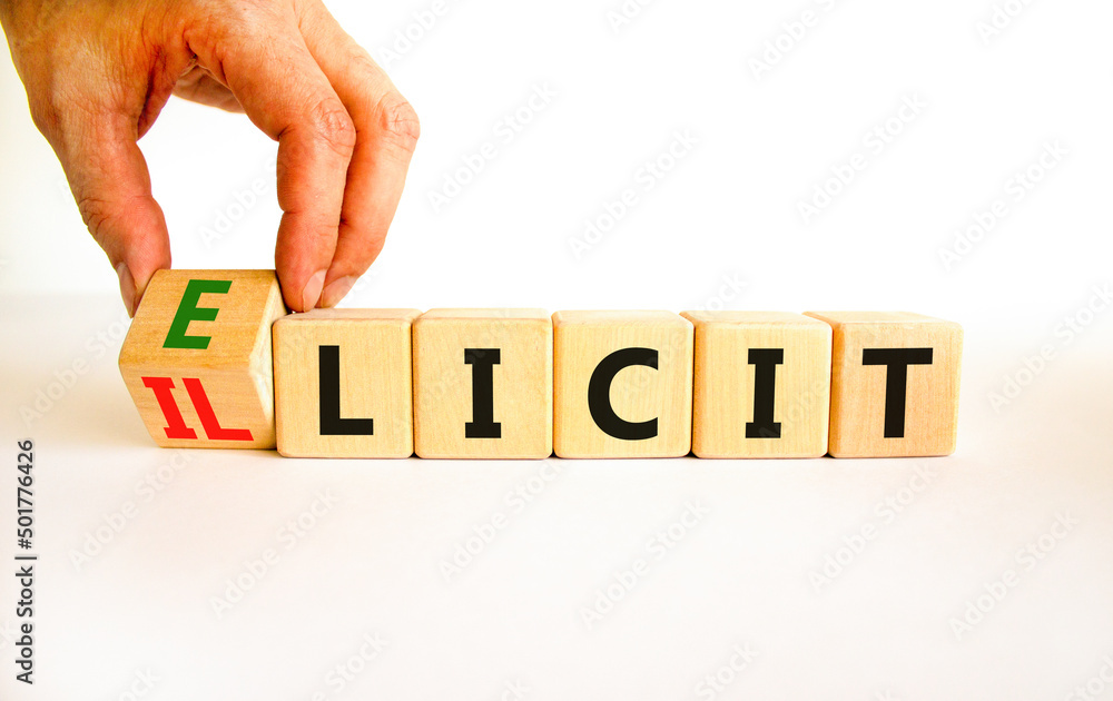 Illicit or elicit symbol. Businessman turns wooden cubes and changes ...
