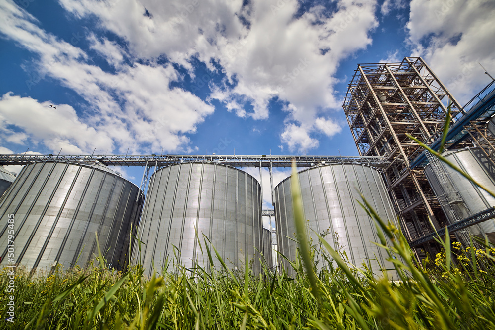 Metal elevator (grain silo) in agriculture zone. Grain Warehouse or ...