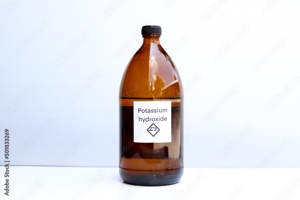 Potassium hydroxide in bottle, chemical in the laboratory Stock Photo ...