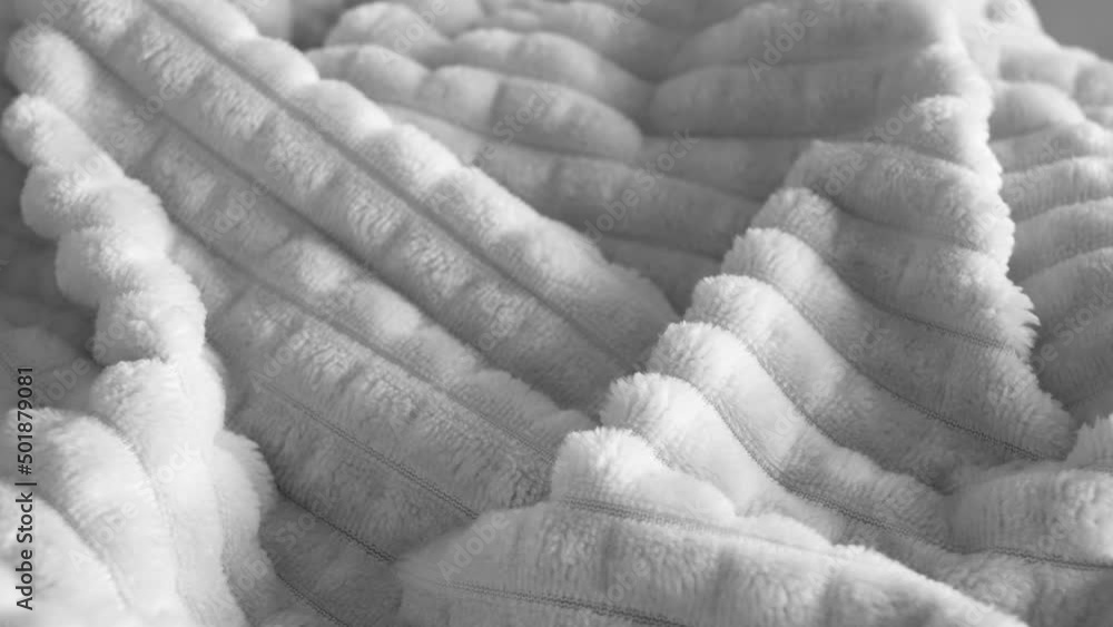 Close-up view 4k stock video footage of fluffy soft textile spinning ...