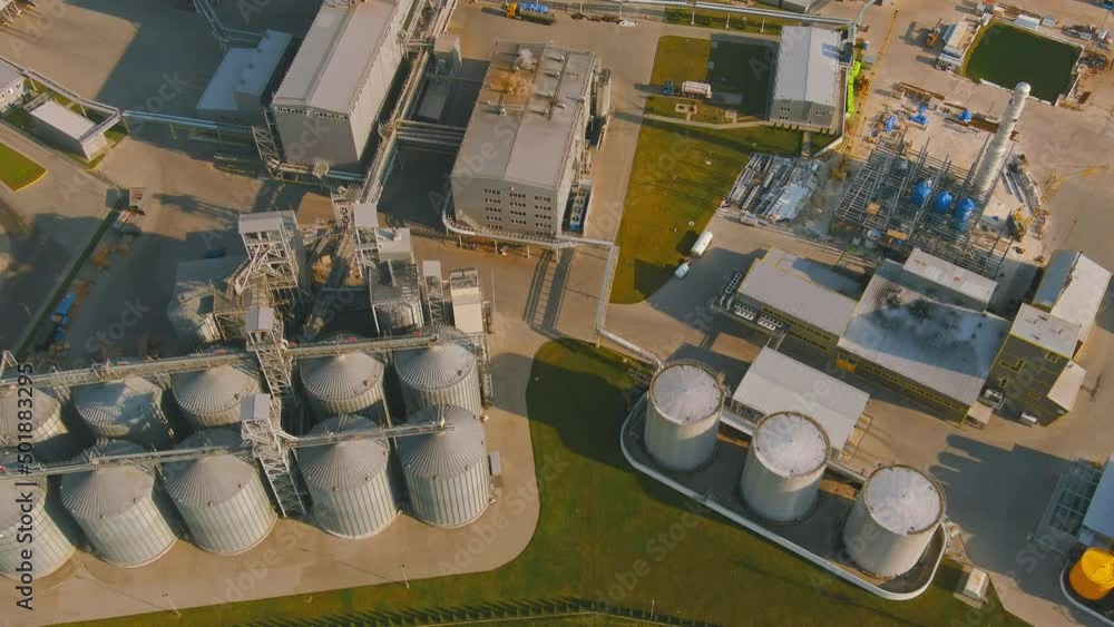 Large white industrial tanks for gasoline and oil. Butter tank at a ...