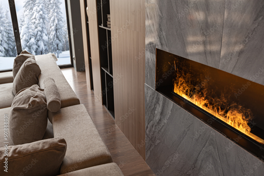 living room, marble wall fireplace and stylish bookcase in chic ...