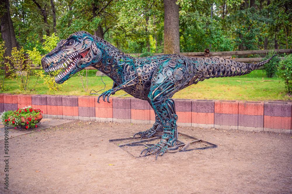 Tyrannosaurus rex T-rex sculpture made of metal gears and parts in ...