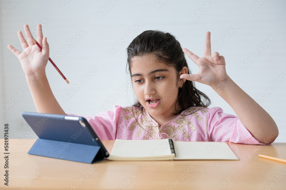 cute Indian girl finger counting gesture and video call to someone for ...