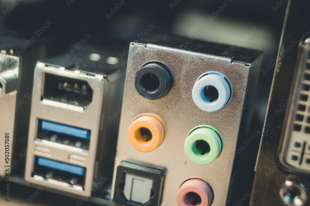 Audio connectors on the back of the computer motherboard to connect ...