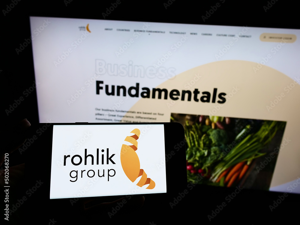 Stuttgart, Germany - 03-30-2022: Person holding smartphone with logo of ...