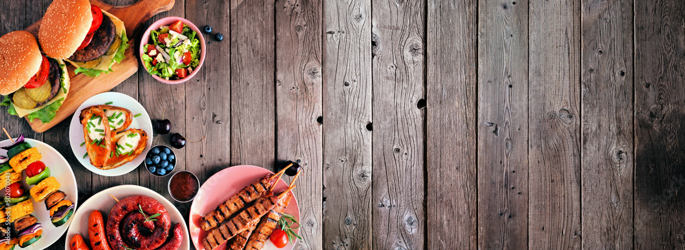 Summer BBQ or picnic food corner border. Variety of burgers, grilled ...