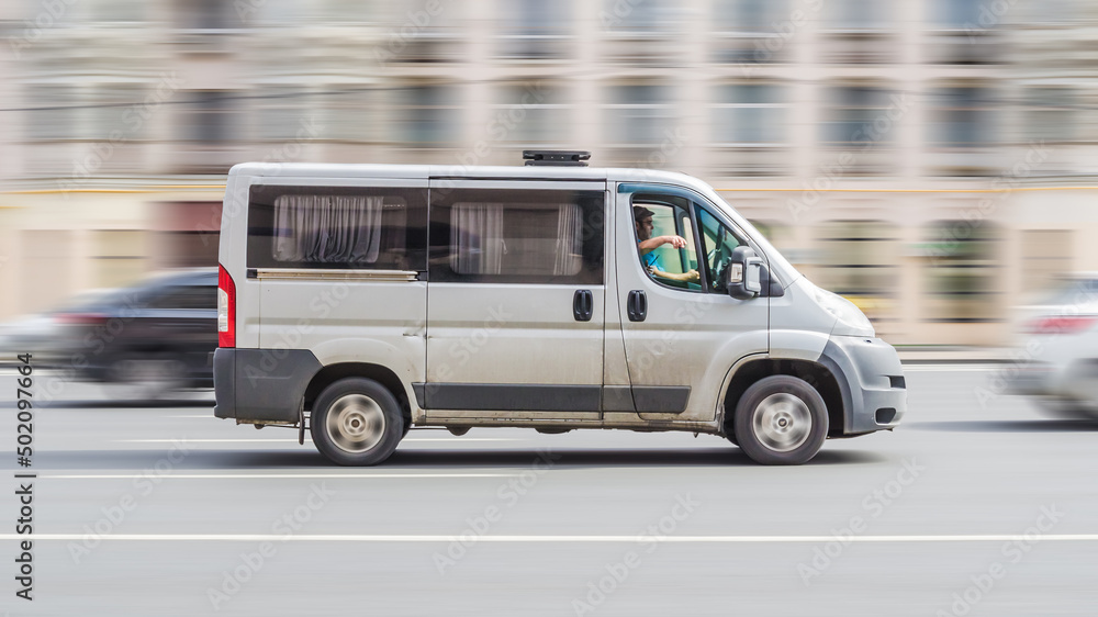 Ram ProMaster 1500 window or glazed van at the city street, side view ...