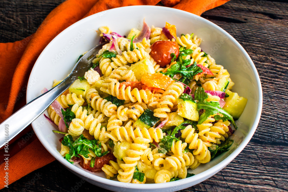 Roasted Veggie Fusilli Pasta with Feta in a Shallow Bowl: Rotini twists ...