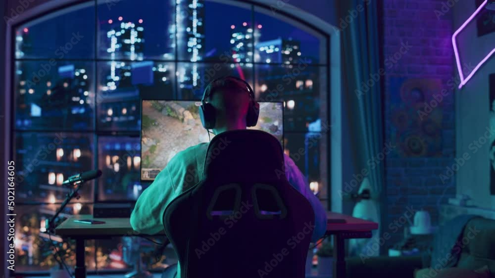 Back of the Head Angle of a Successful Gamer Winning in a Video Game on ...