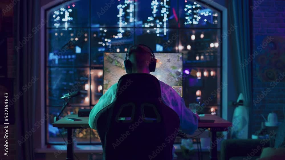 Back of the Head Angle of a Successful Gamer Winning in a Video Game on ...