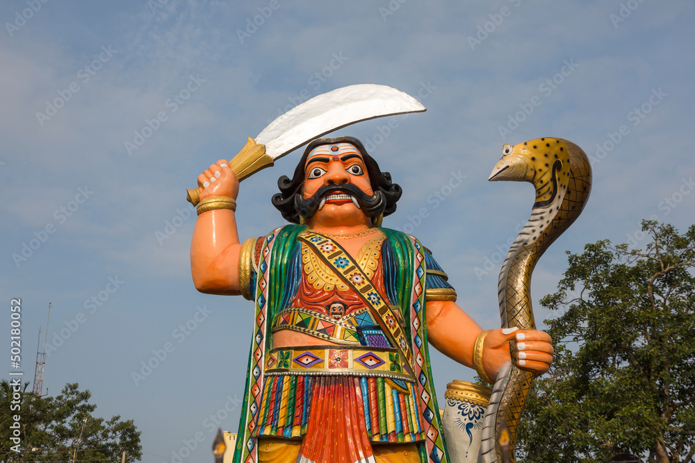 Statue of the mythological Hindu demon Mahishasura at Chamundi Hill in ...