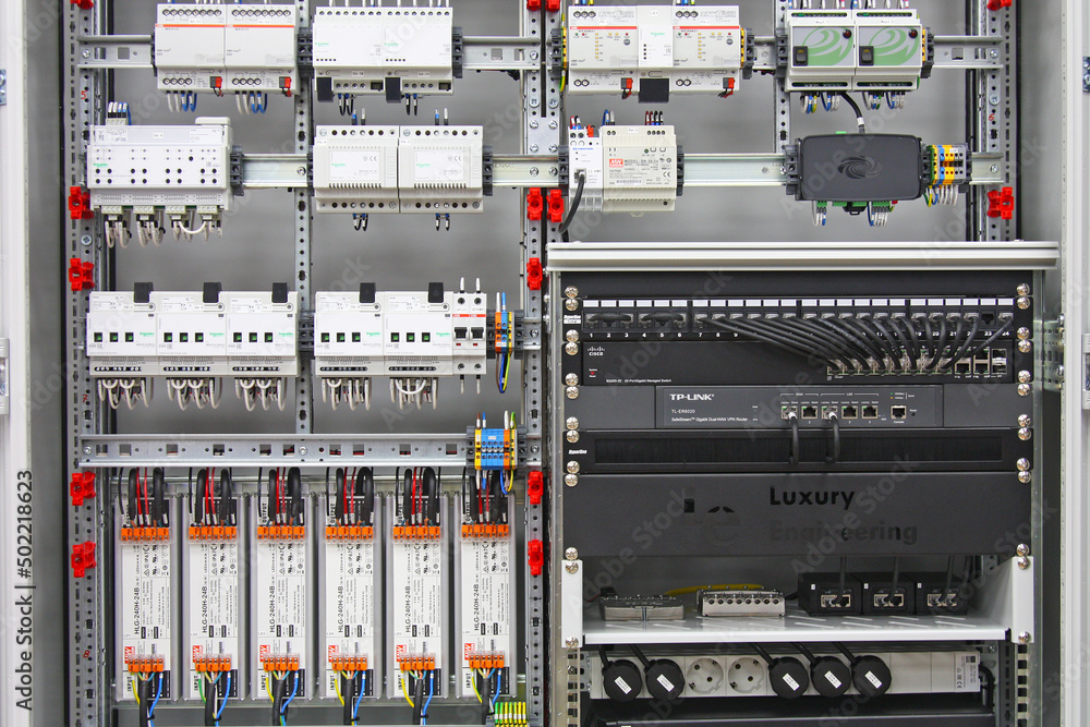 Connection of automation modules in the electrical panel at ABB. Stock ...