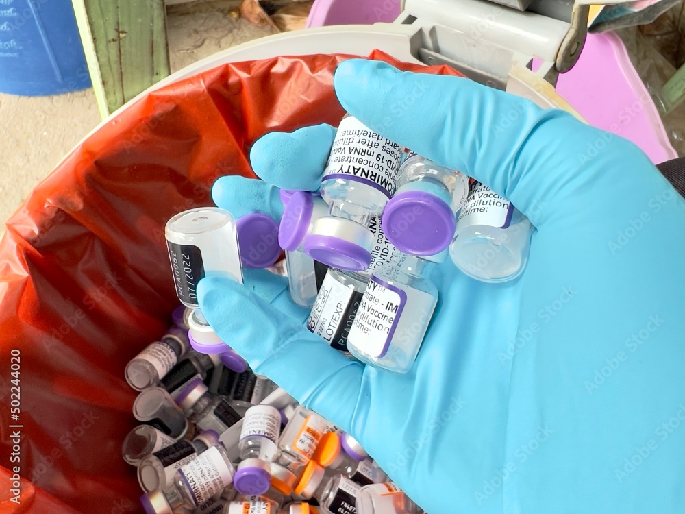 Covid-19 coronavirus vaccine and expired vaccine. Drug needle syringe ...