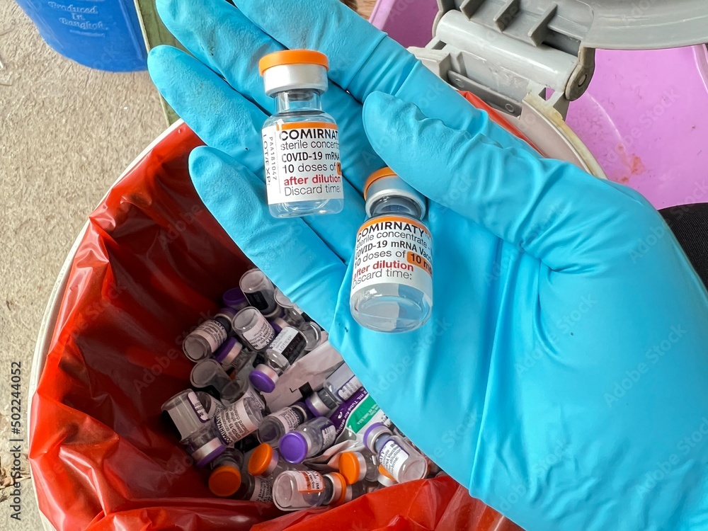 Covid-19 coronavirus vaccine and expired vaccine. Drug needle syringe ...
