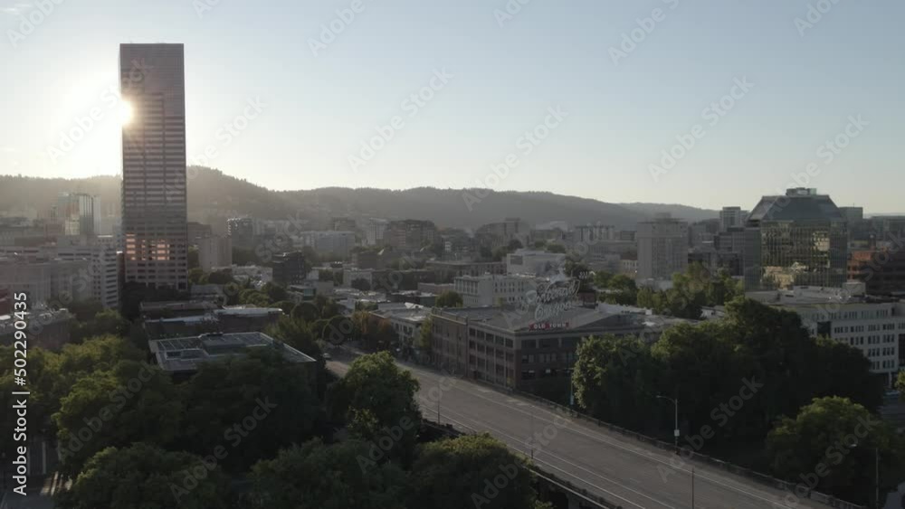Drone aerial shot over a city downtown: Soaring above towering ...