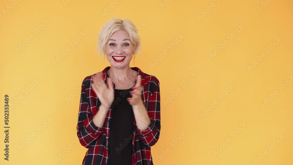 Bravo applause. Grimacing woman. Well done. Skeptic middle-aged lady ...