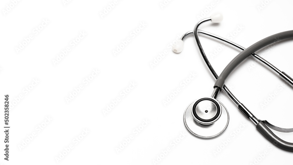 Health care and medical check up concept. Stethoscope on white ...