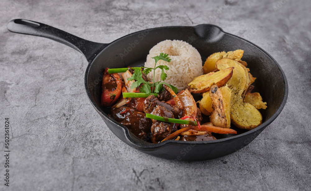 Peruvian d food - Lomo saltado - beef tenderloin with purple onion ...