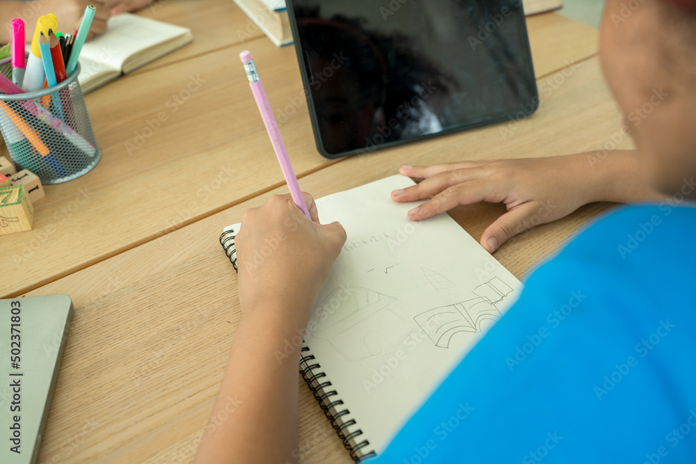 Student children doing test in primary school,Children writing notes in ...