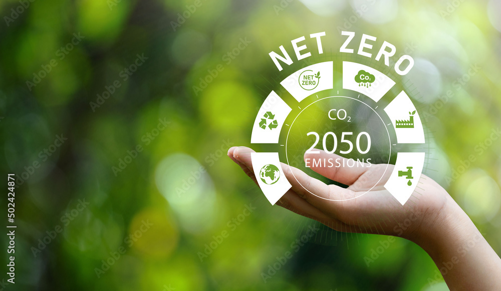 net zero 2050 emissions icon concept in hand for the environment policy ...