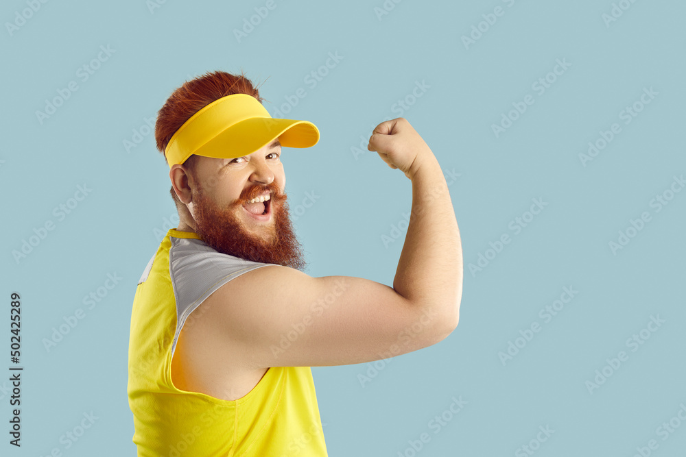 Funny strong fat man enjoying fitness exercises during his workout at ...