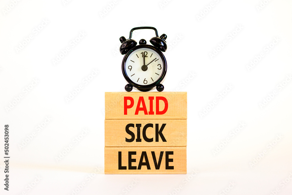 Paid sick leave symbol. Concept words Paid sick leave on wooden blocks ...