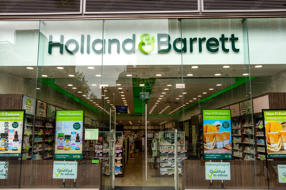 London- Holland and Barrett store exterior, a British health food brand ...