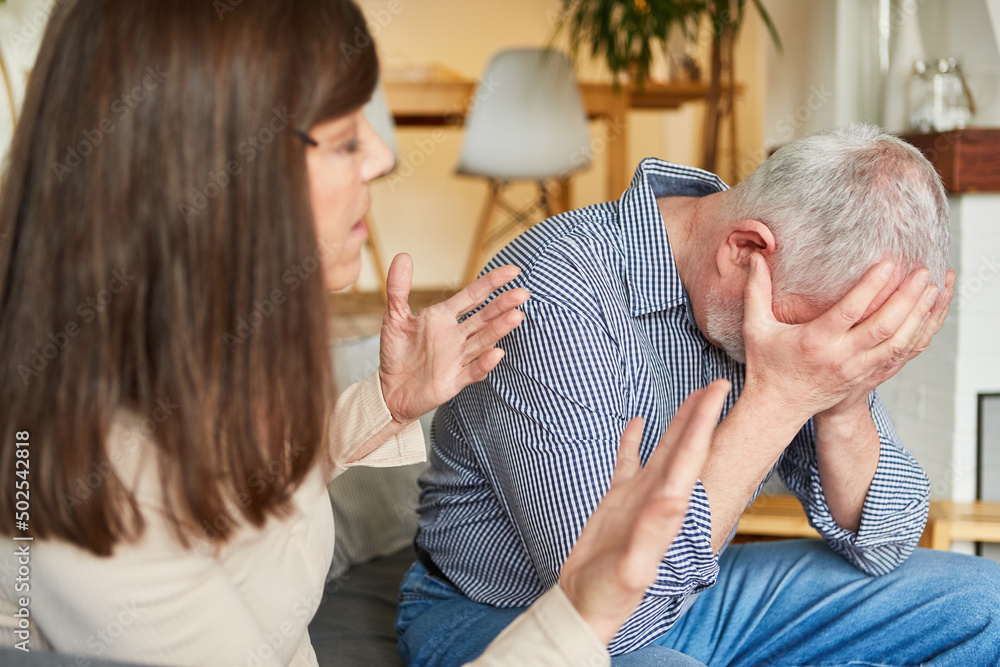 Scolding elderly woman and a crying man Stock Photo | Adobe Stock