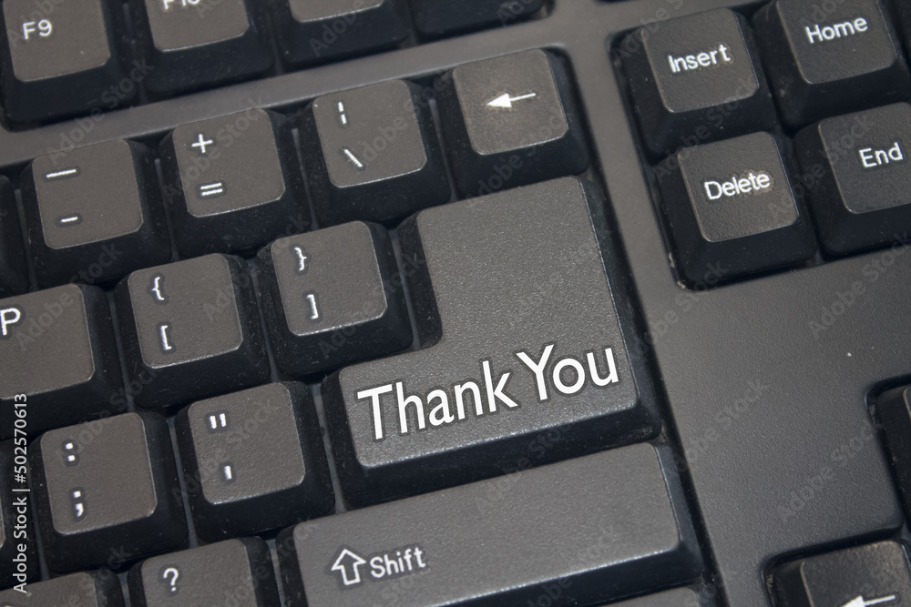 Black Computer Keyboard with Thank You text. Close-up of an electronic ...
