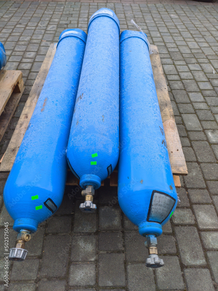 Oxygen cylinder with compressed gas. Blue Oxygen tanks for industry ...