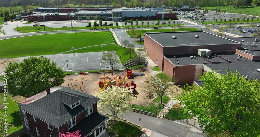 Public school campus in USA. Aerial in spring of elementary playground ...