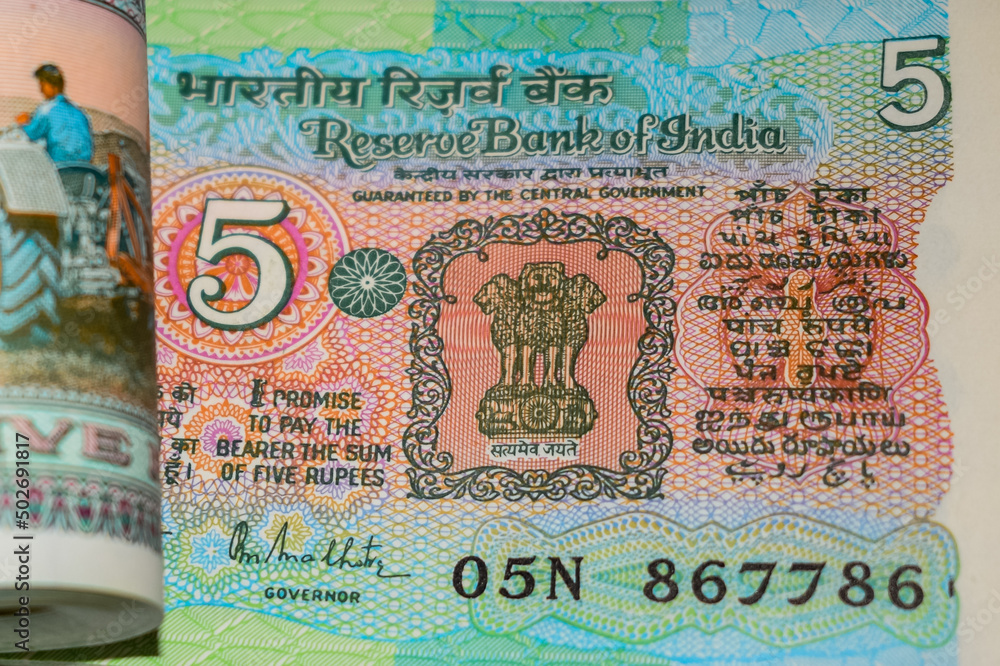 Old Five Rupee notes combined on the table, India money on the rotating ...