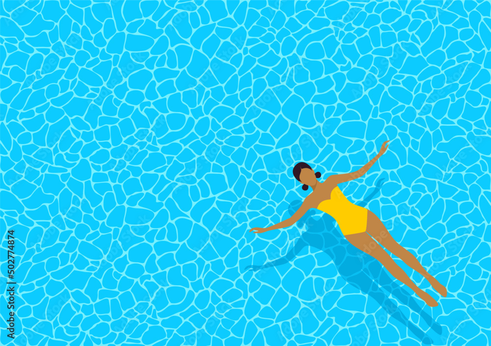 A woman in a yellow swimsuit floating relaxed on her back in the pool ...