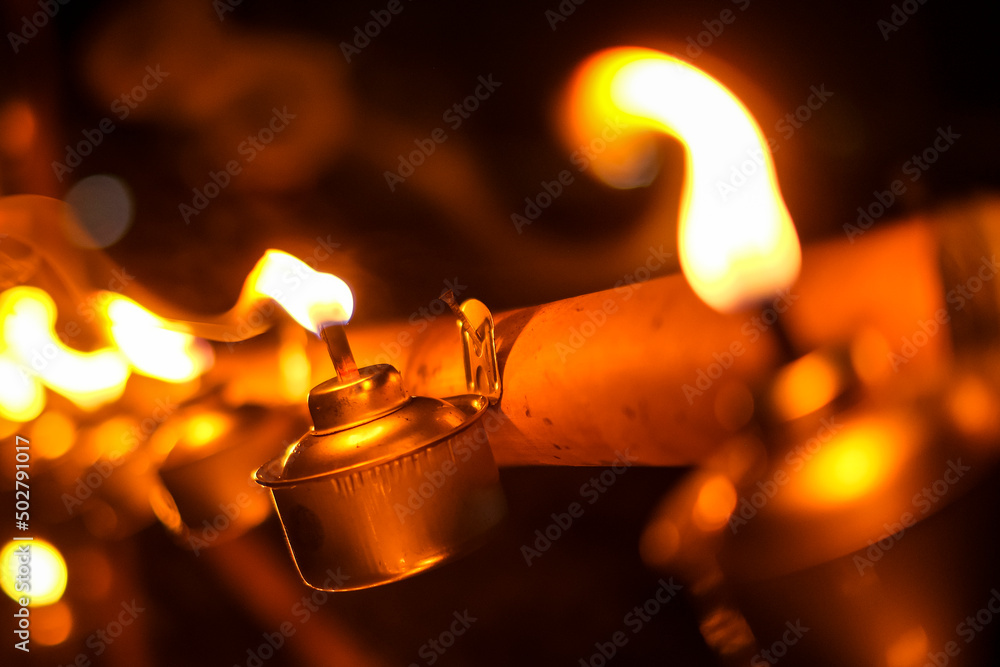 Malay tradition kerosene oil lamp or pelita in selective focus during ...