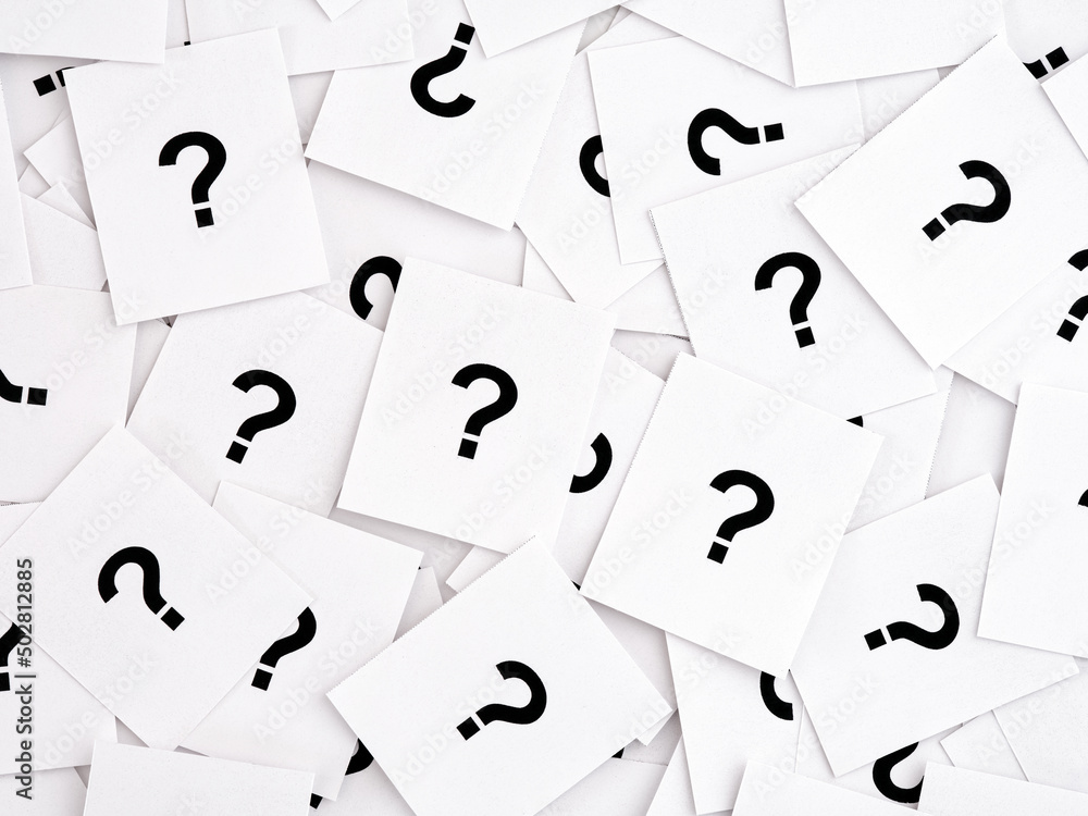 A lot of paper notes with question marks. Stock Photo | Adobe Stock