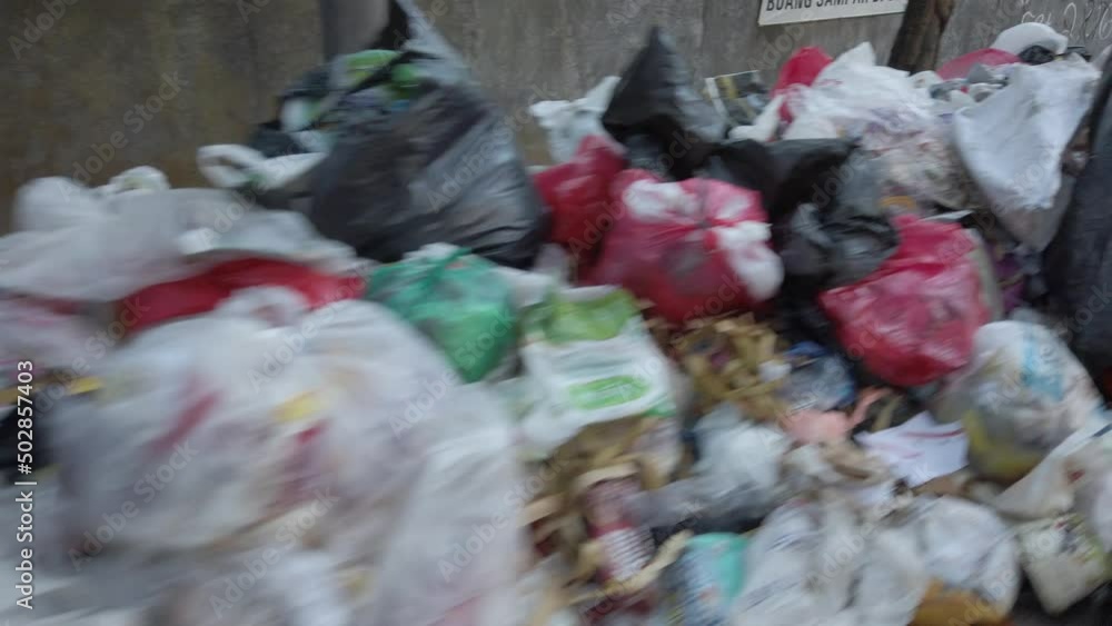 plastic pollution trash waste garbage in the public street in Indonesia ...