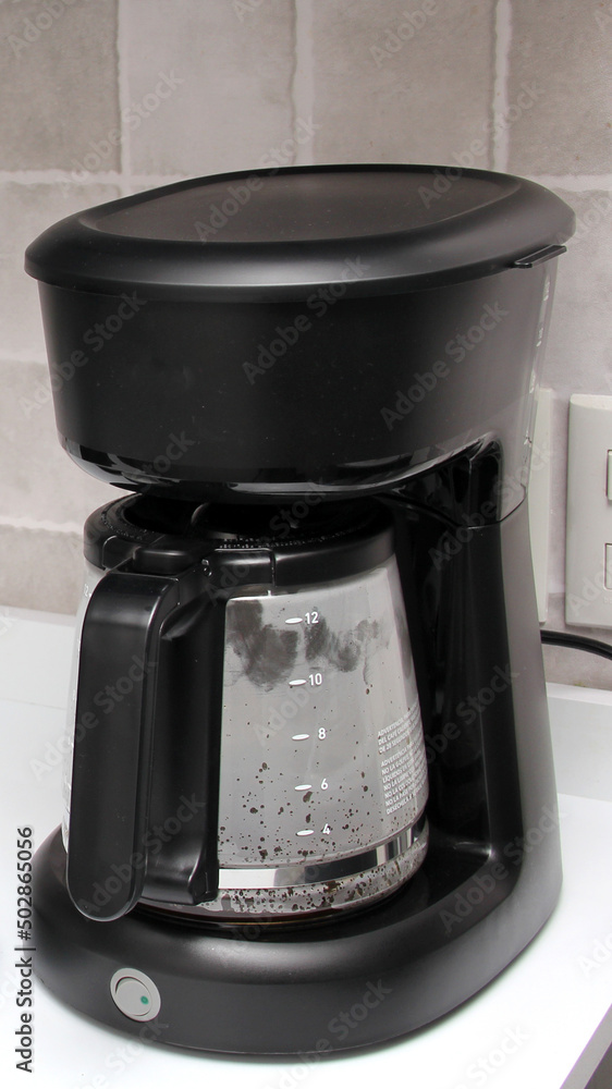 Black coffee maker to prepare American coffee with glass jug with ...