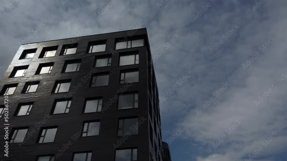 Exterior of a high-rise apartment building facade, windows and ...