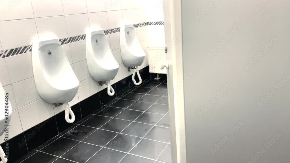 public toilet urinals. men a toilet in the office general plan indoor ...