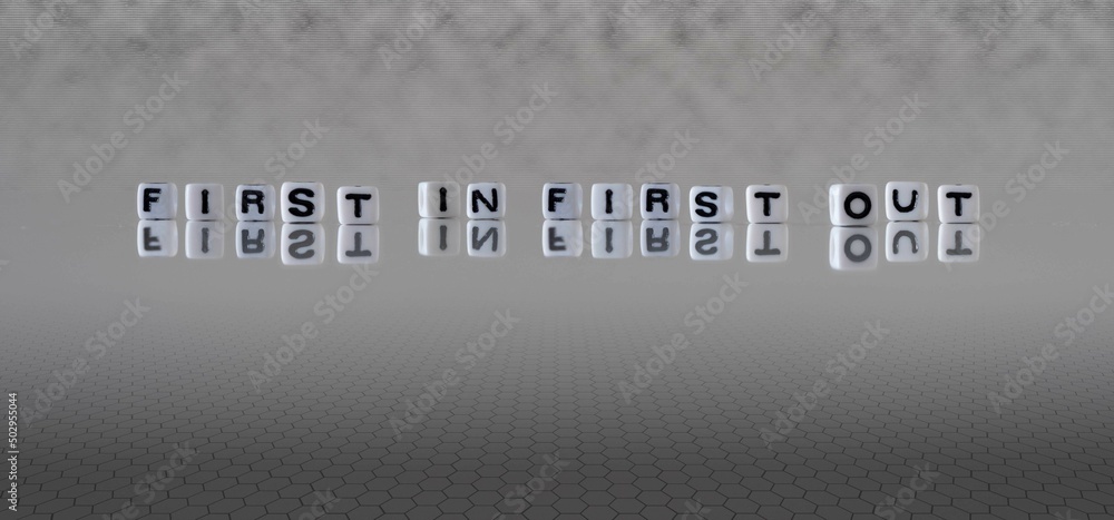 Foto de first in first out word or concept represented by black and ...
