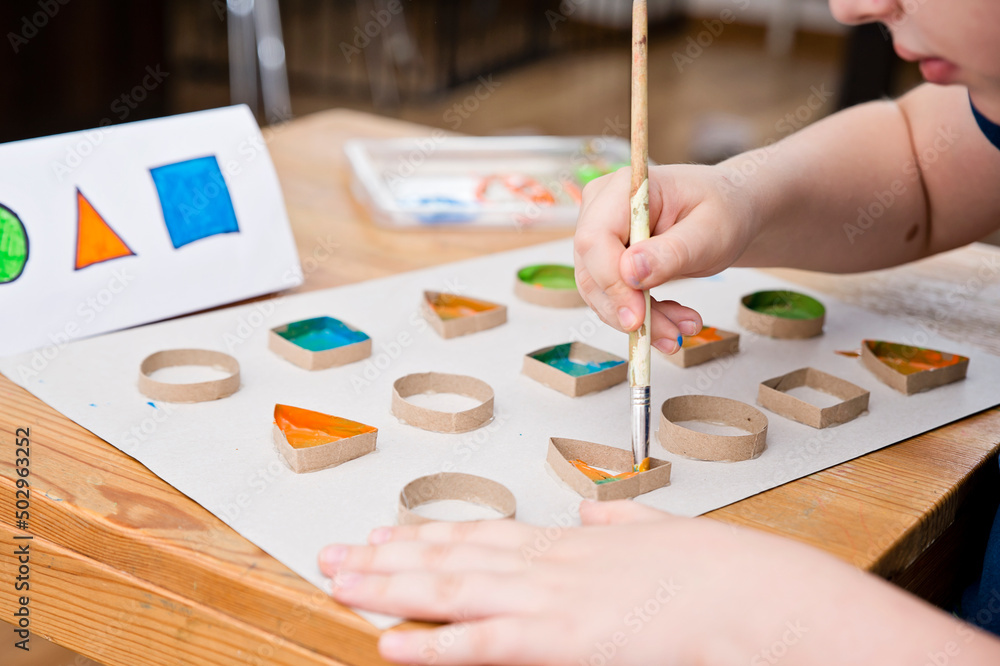 Child learn geometric shapes. Fine motor skills. Preschool or special ...