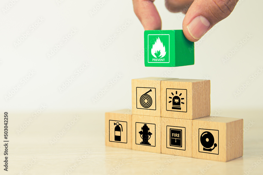 Fire prevention, Hand choose cube wooden block stack with door exit ...