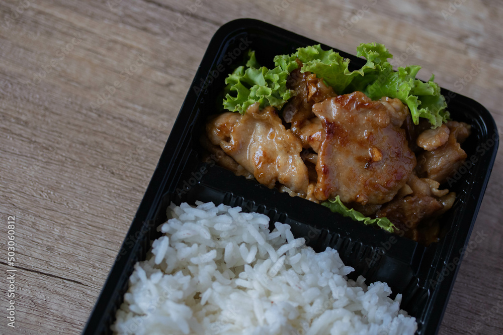 Fried pork rice with steamed rice in a food delivery box Stock Photo ...