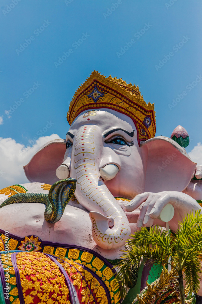 Vertical shot of the statue of Ganesha in Ganesha Park. Sarika ...